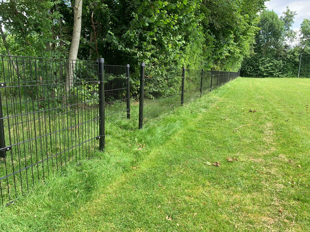 AFRASTERING TRAININGSVELD